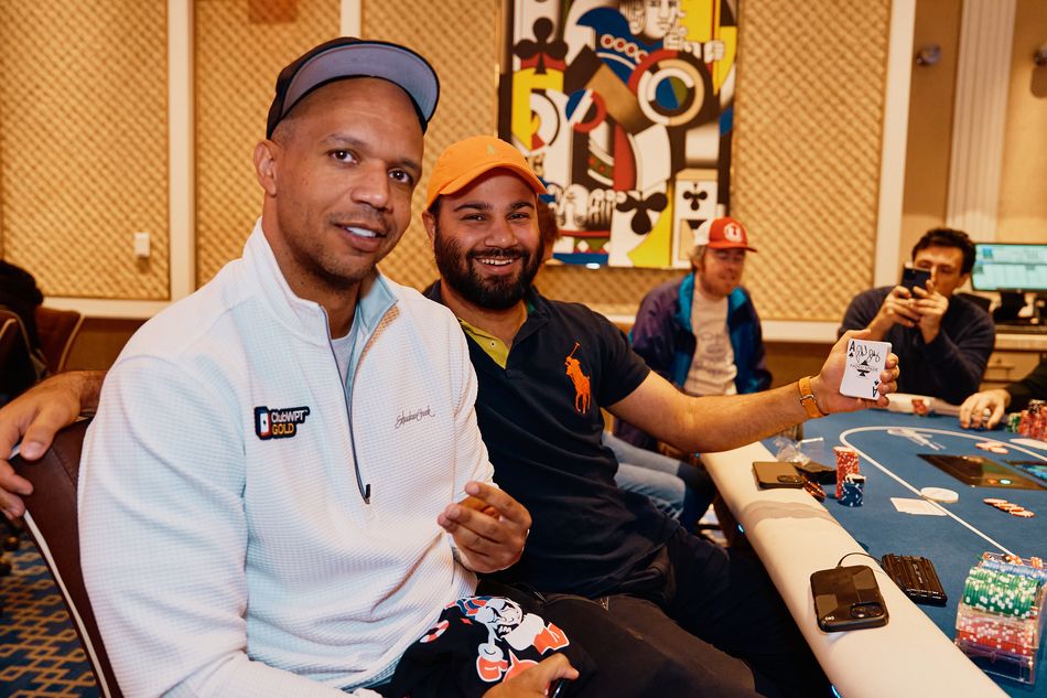 Phil Ivey plays low-limit poker with Christmas spirit & a smile